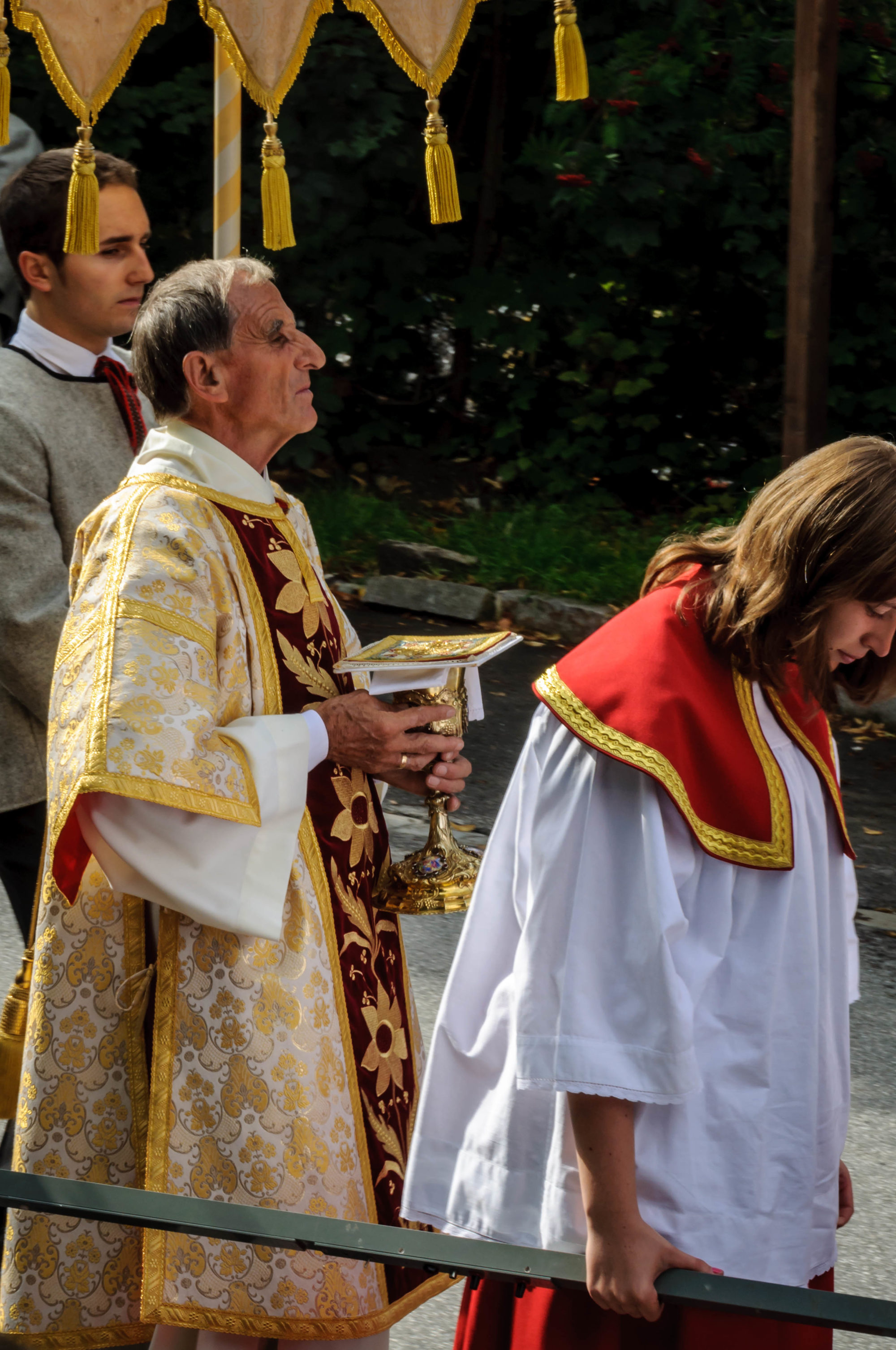 Priest Carrying a Chalice - IMB